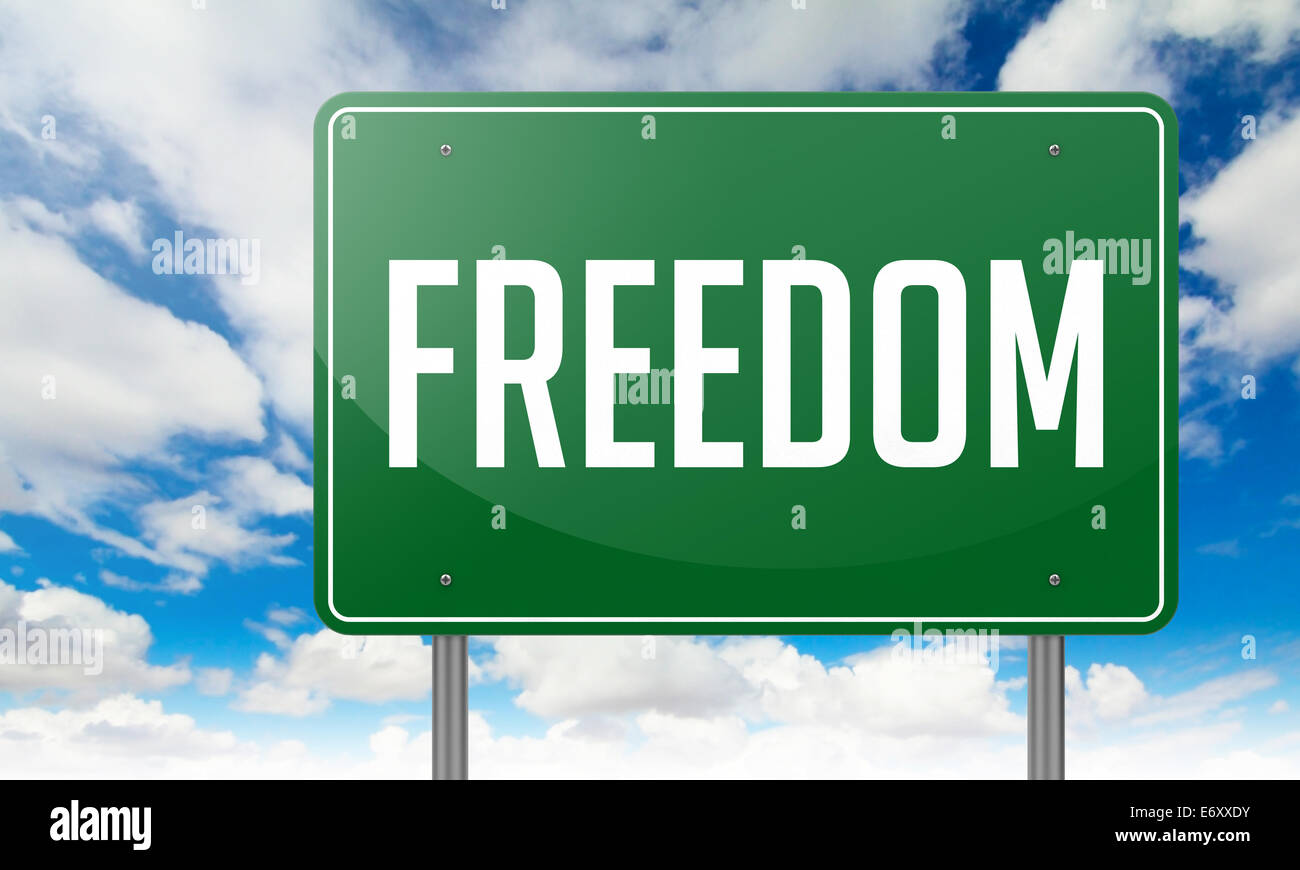 Freedom on Green Highway Signpost Stock Photo - Alamy