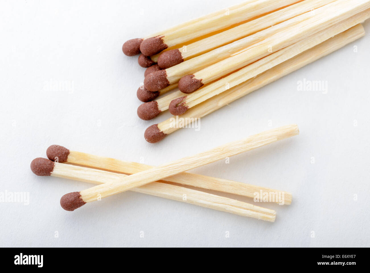 Close-up of matches on white paper background Stock Photo - Alamy