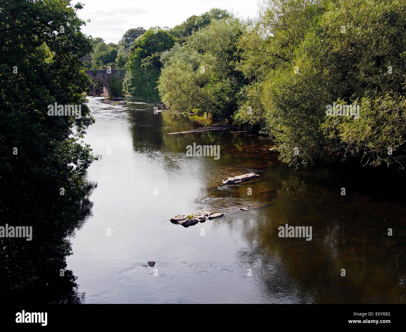 A tranquil scene on a summer evening - view upstream of the River Usk ...