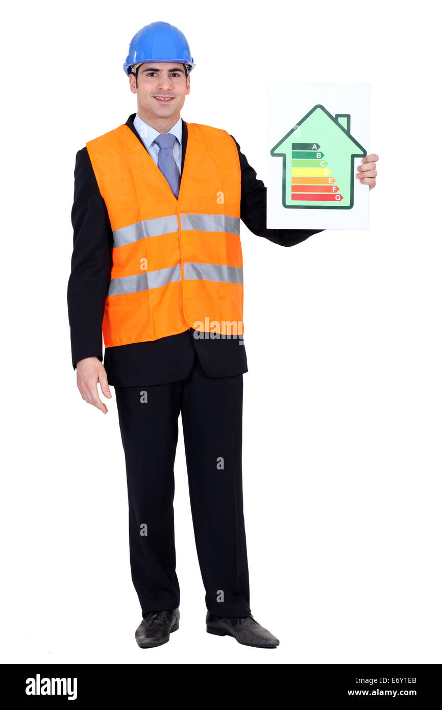 Engineer holding up efficiency chart Stock Photo - Alamy
