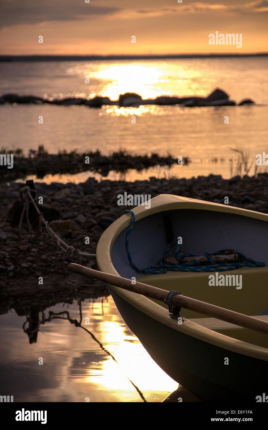Rowing to the sunset Stock Photo - Alamy
