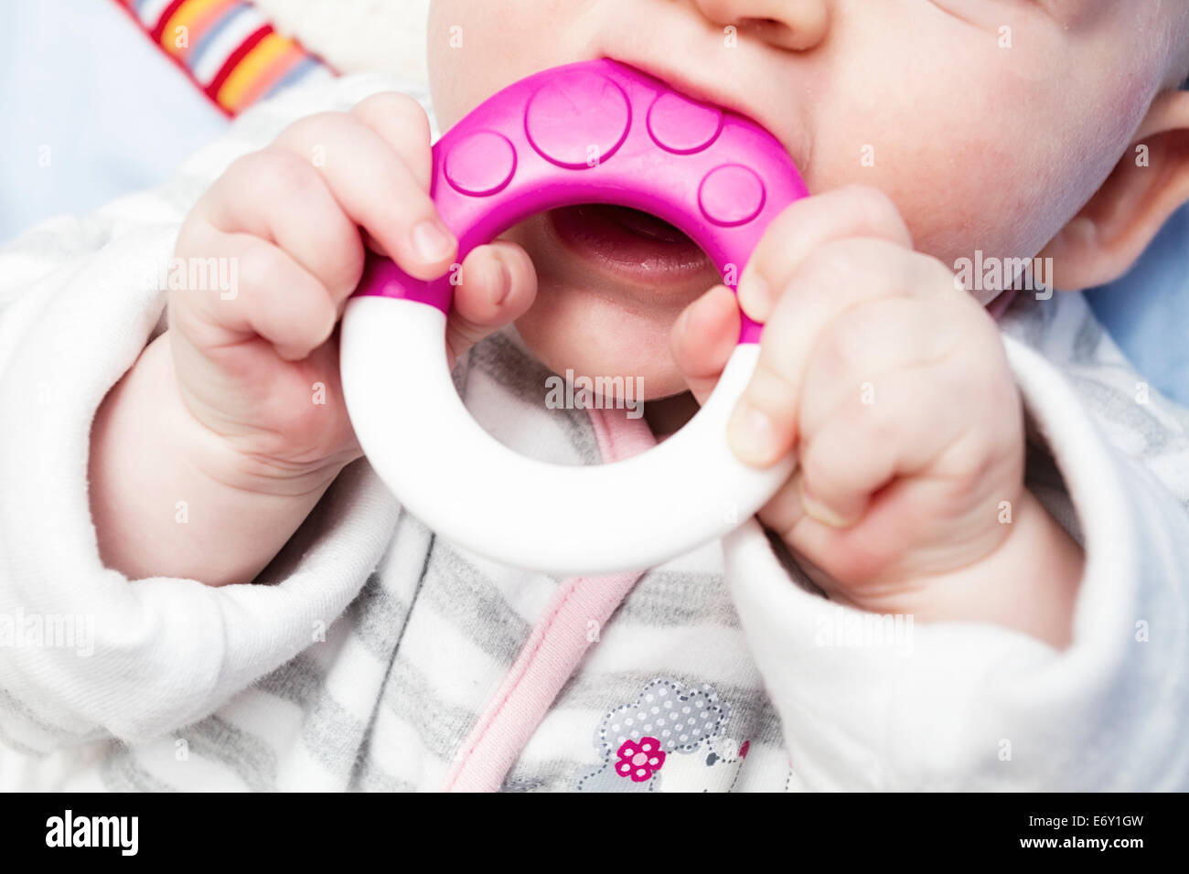 Child chewing hands hi-res stock photography and images - Alamy