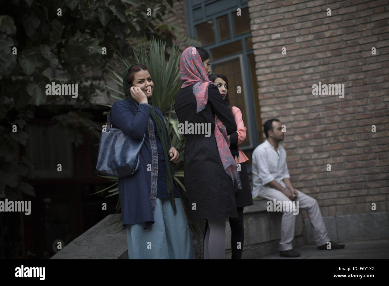 Iranian woman cell hi-res stock photography and images - Alamy