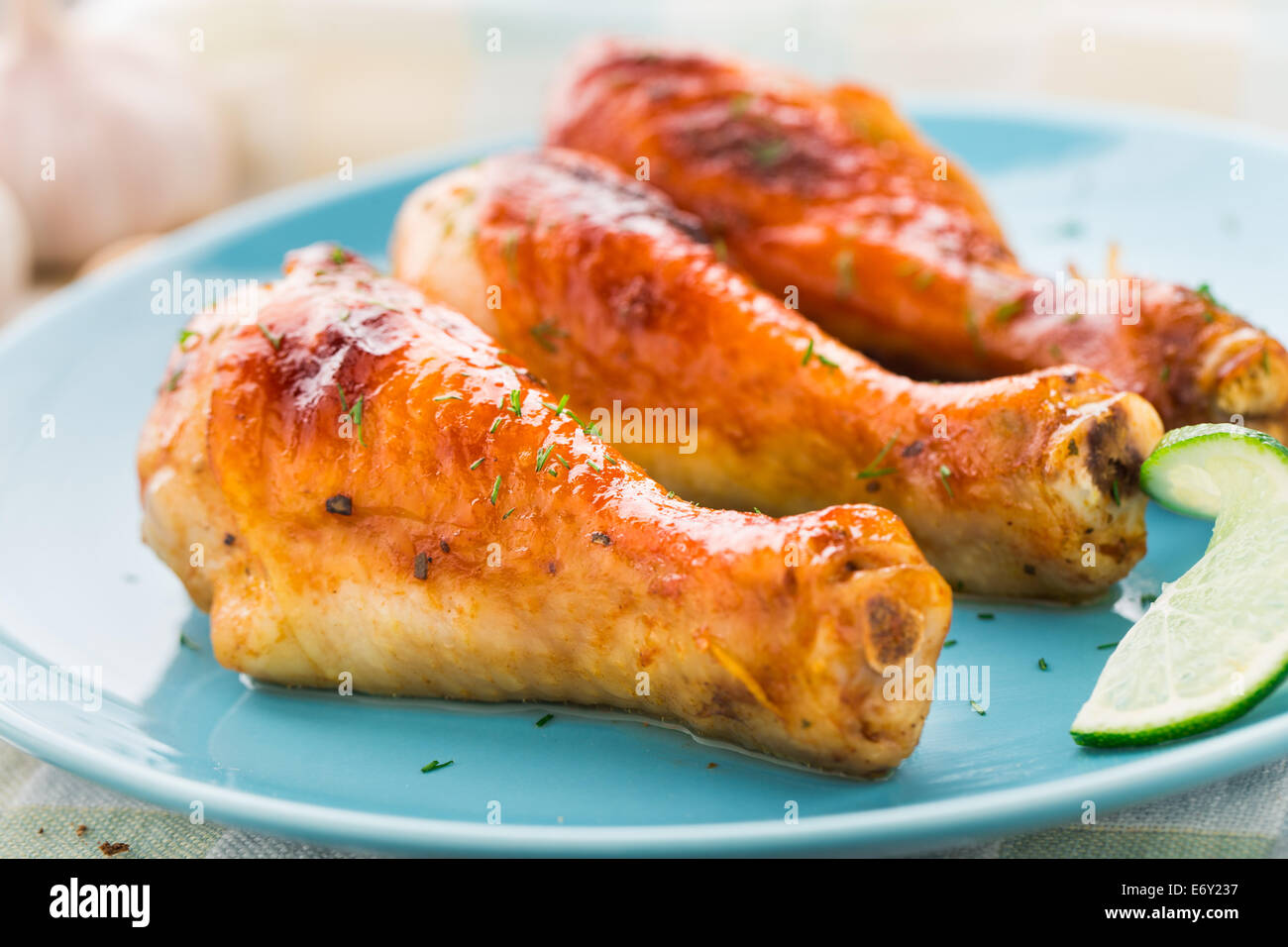 Roasted chicken legs Stock Photo - Alamy