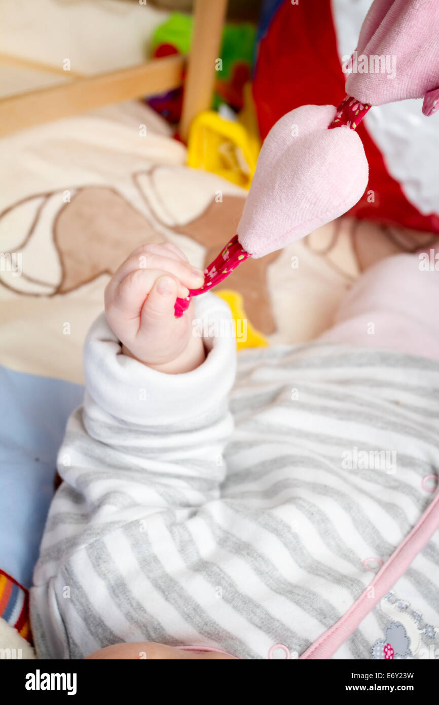Child chewing hands hi-res stock photography and images - Alamy