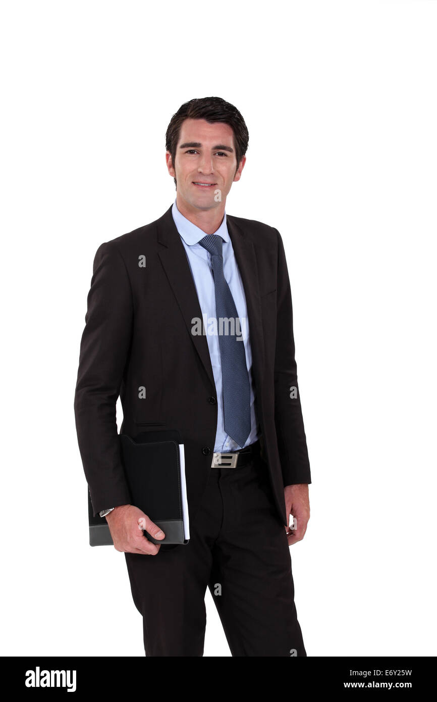 portrait of businessman holding agenda isolated on white Stock Photo ... portrait of businessman holding agenda isolated on white Stock Photo ...
