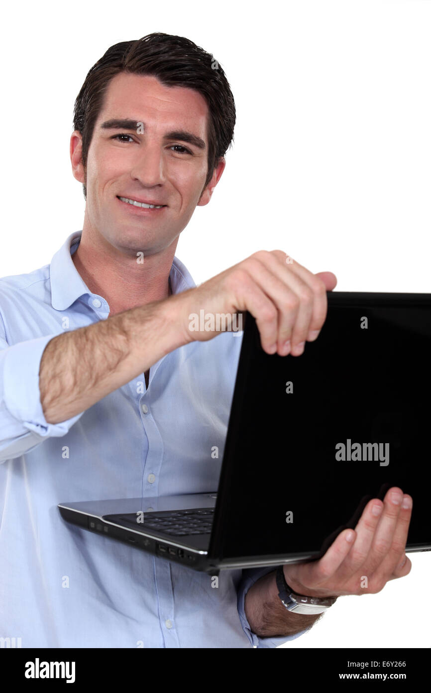 Businessman with a laptop Stock Photo - Alamy