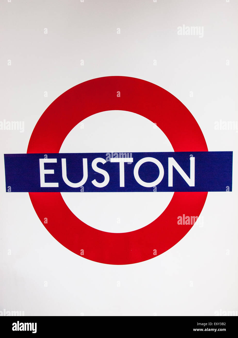 london underground symbol for euston station against plain white wall ...