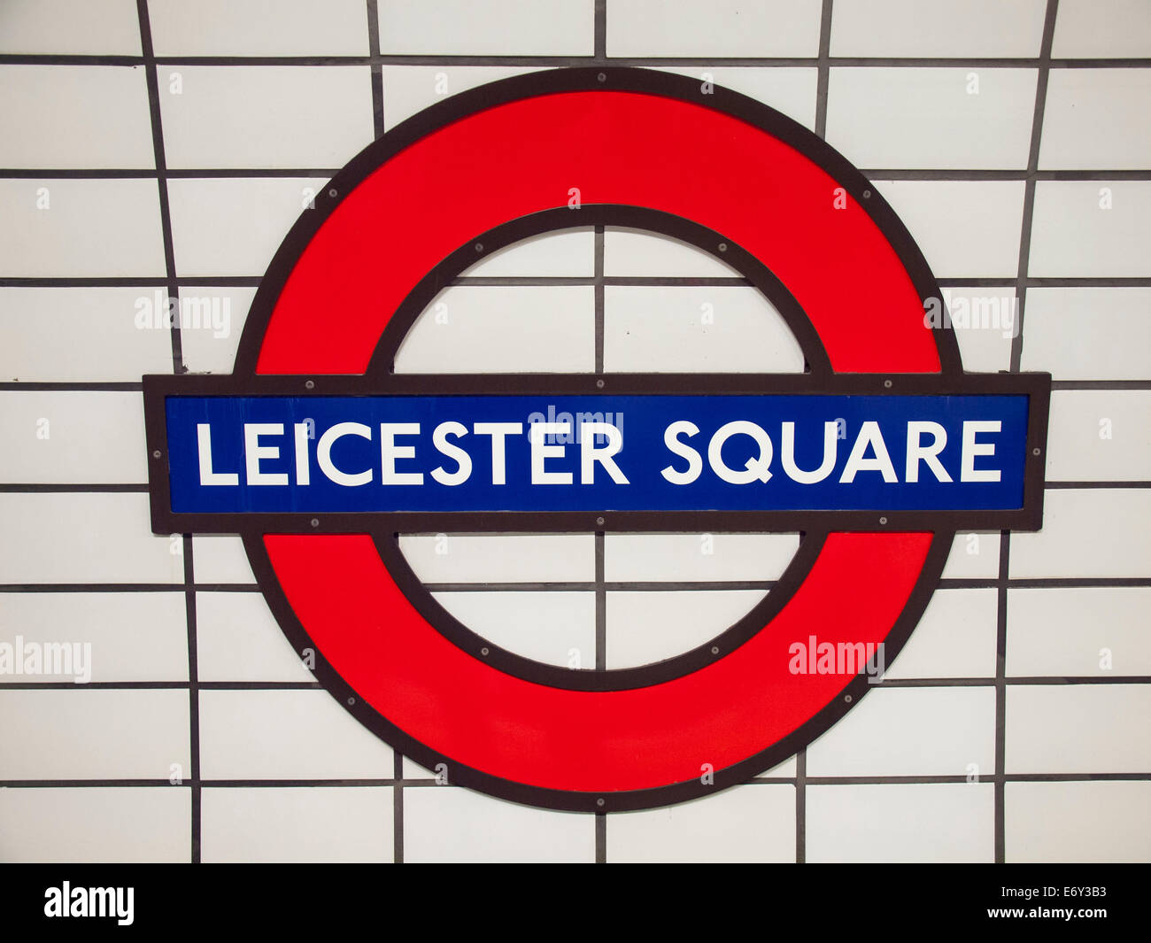 london underground symbol for leicester square station against white ...