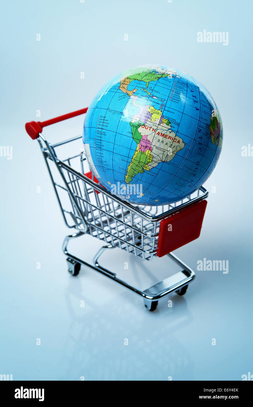 World in a shopping cart. Global shopping concept Stock Photo - Alamy