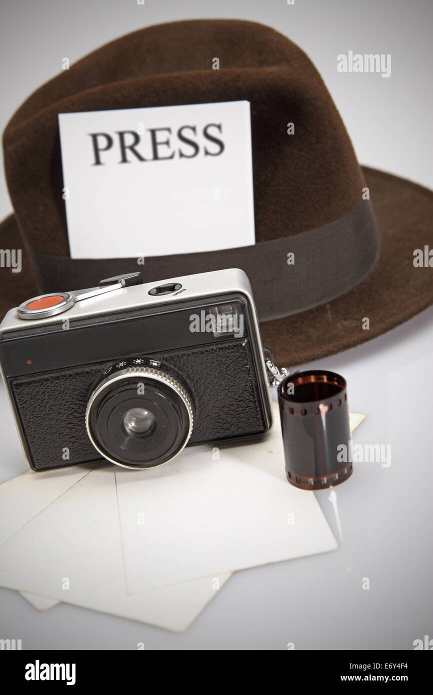 Retro Camera & Fedora Hat on the white background. Press concept Stock ...