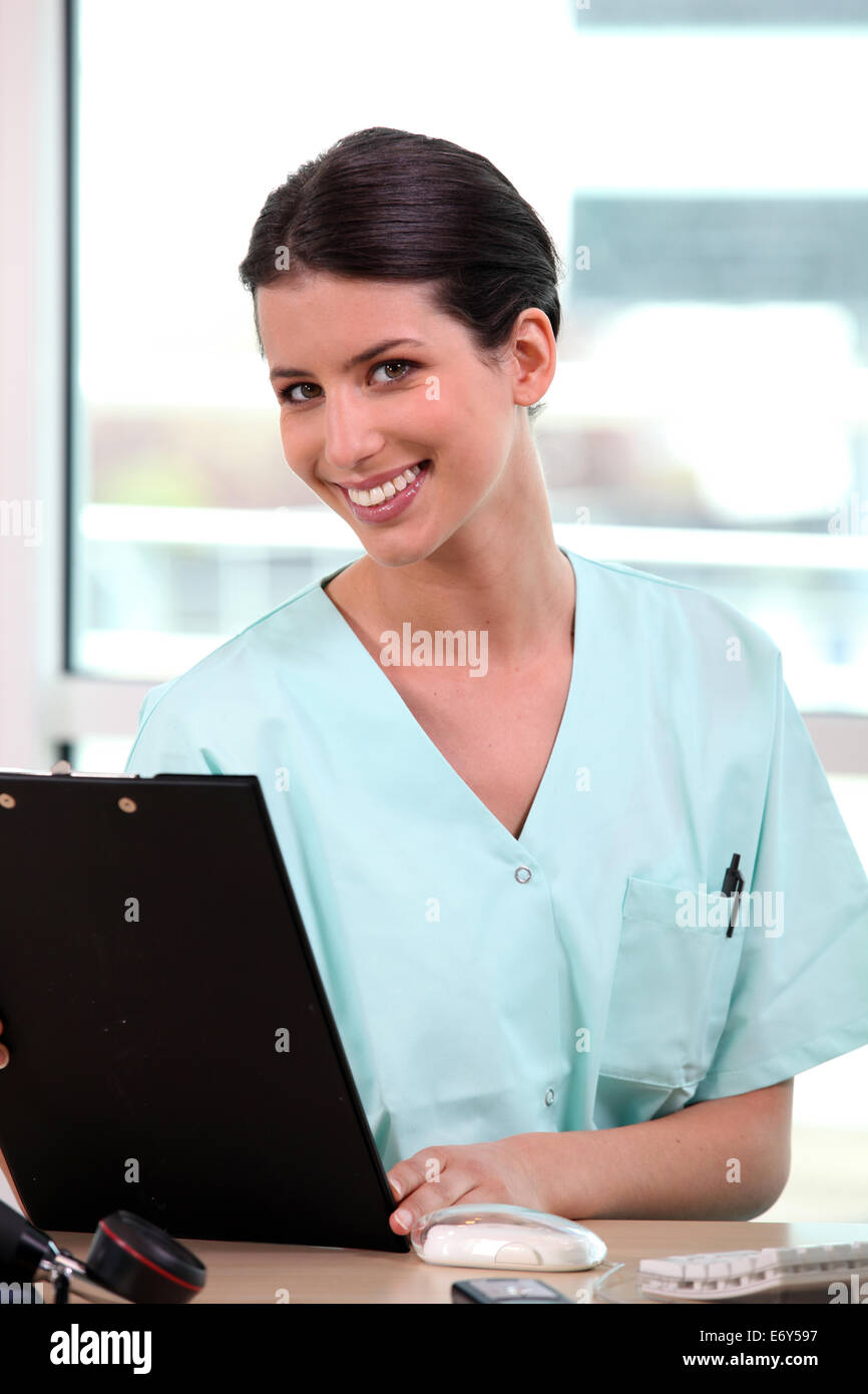 Nurse in front of computer Stock Photo - Alamy