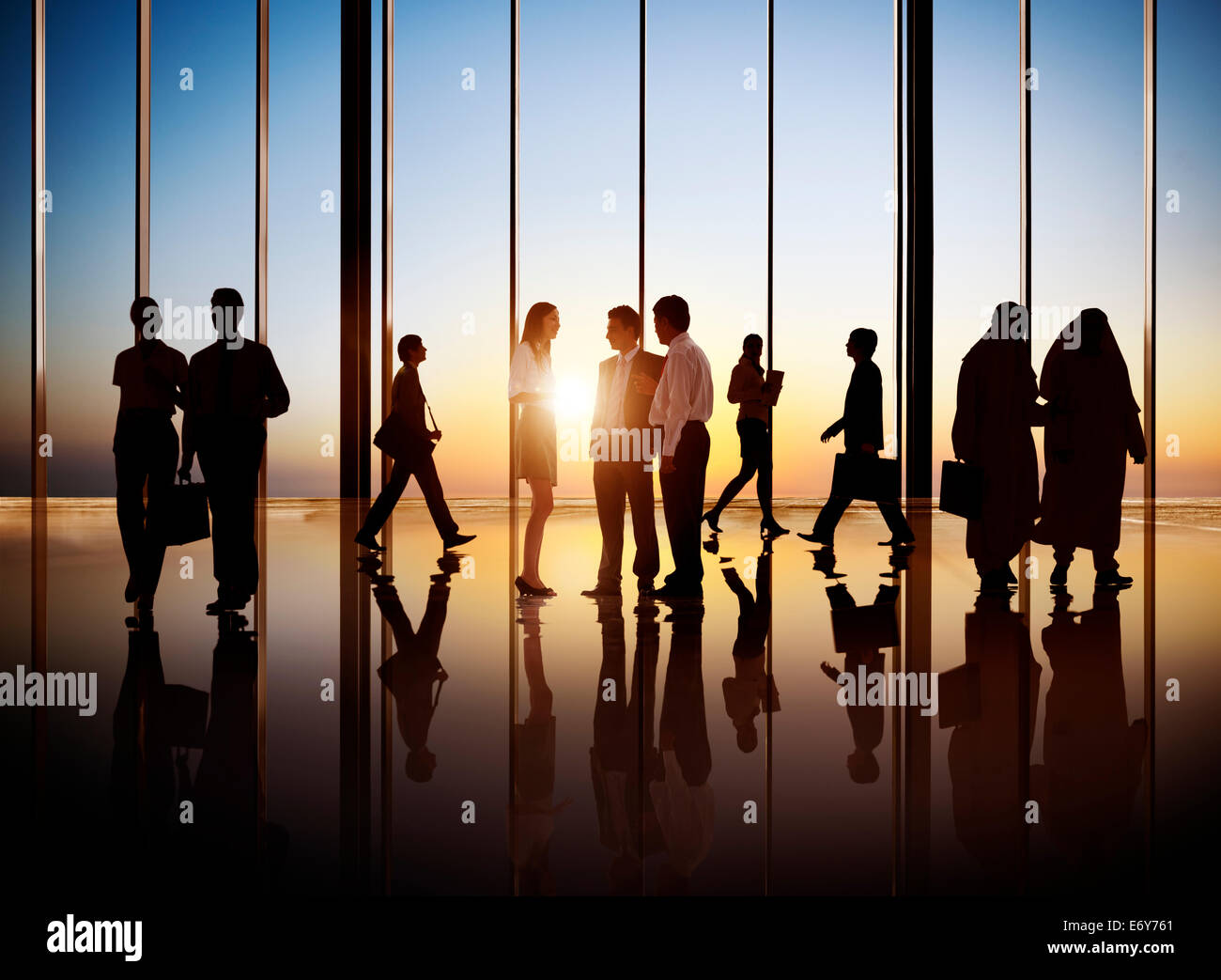 Group of busy business people in the building interior Stock Photo - Alamy