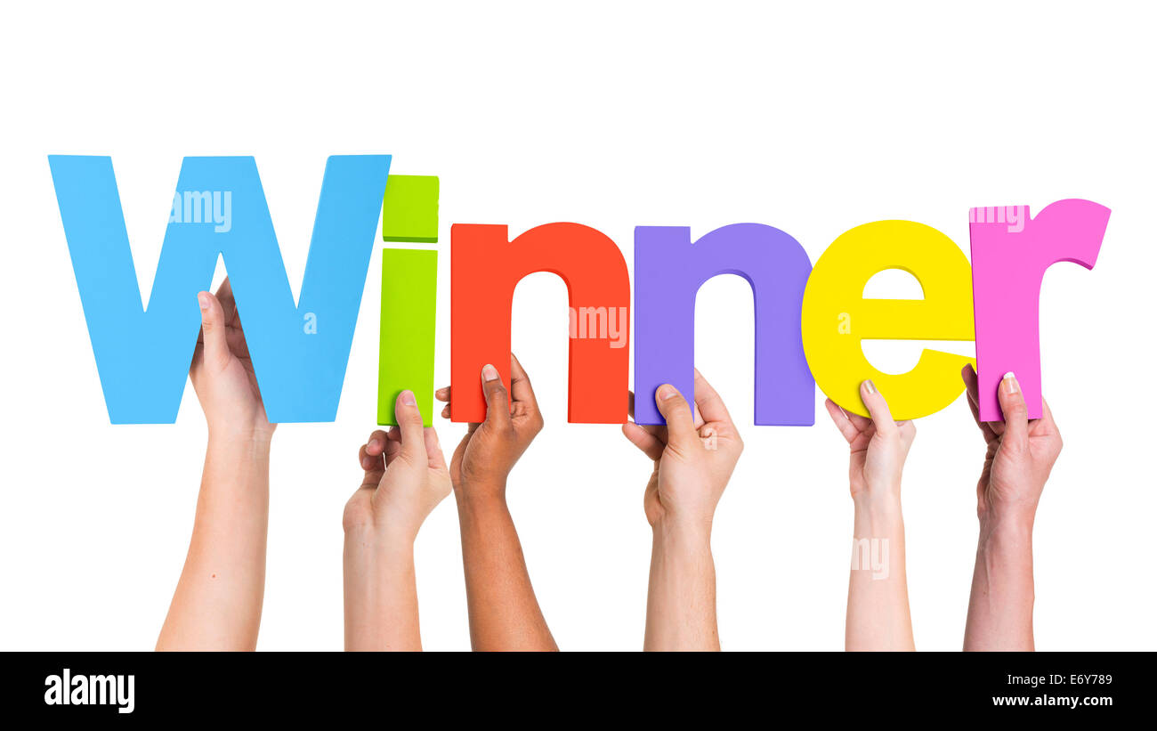 Multiethnic Group of Hands Holding Winner Stock Photo - Alamy