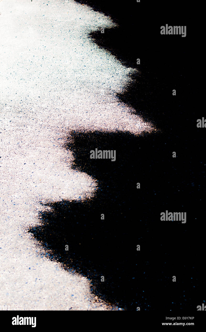 Abstract background of tan shapes on black background Stock Photo - Alamy