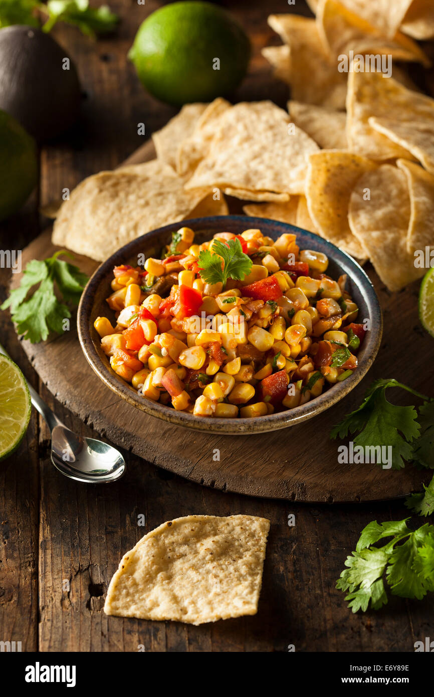 Homemade Spicy Corn Salsa with Tortilla Chips Stock Photo - Alamy