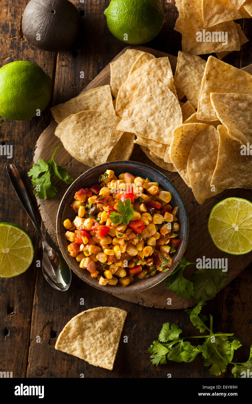 Homemade Spicy Corn Salsa with Tortilla Chips Stock Photo - Alamy