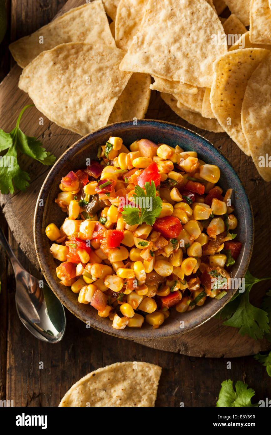 Homemade Spicy Corn Salsa with Tortilla Chips Stock Photo - Alamy