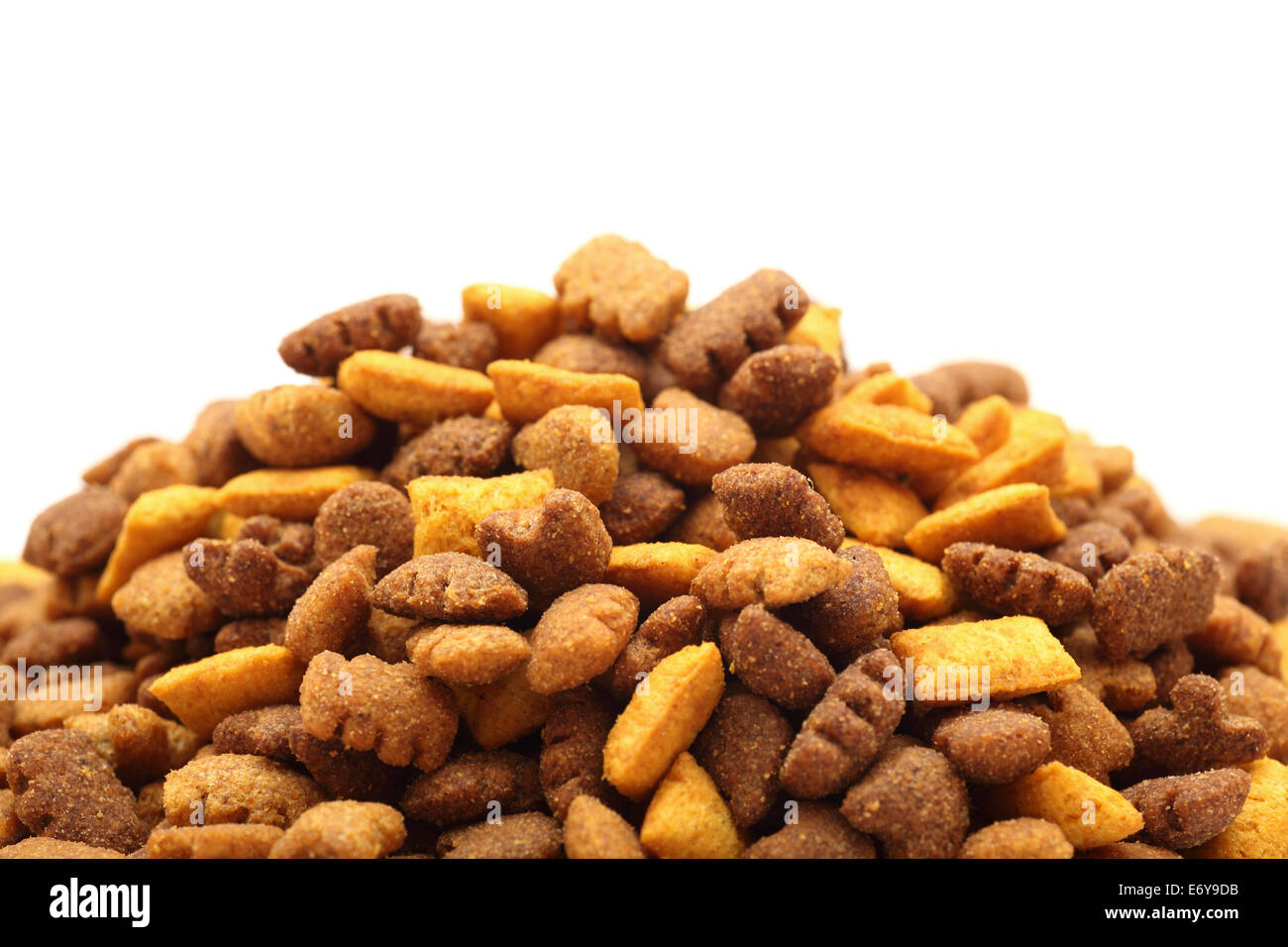 Heap of cat food against white background. Closeup Stock Photo - Alamy