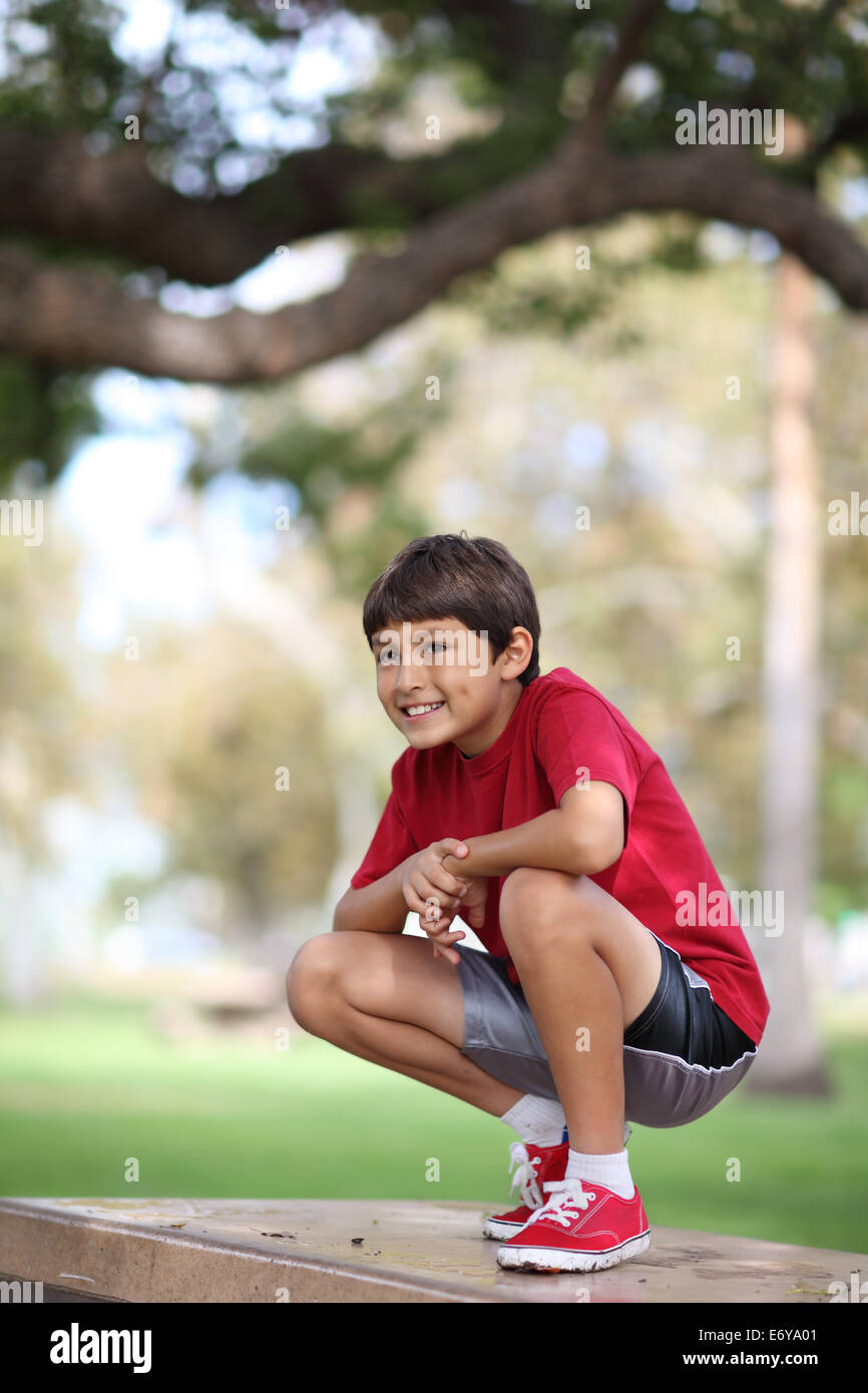 Boy relaxing in a park hi-res stock photography and images - Alamy