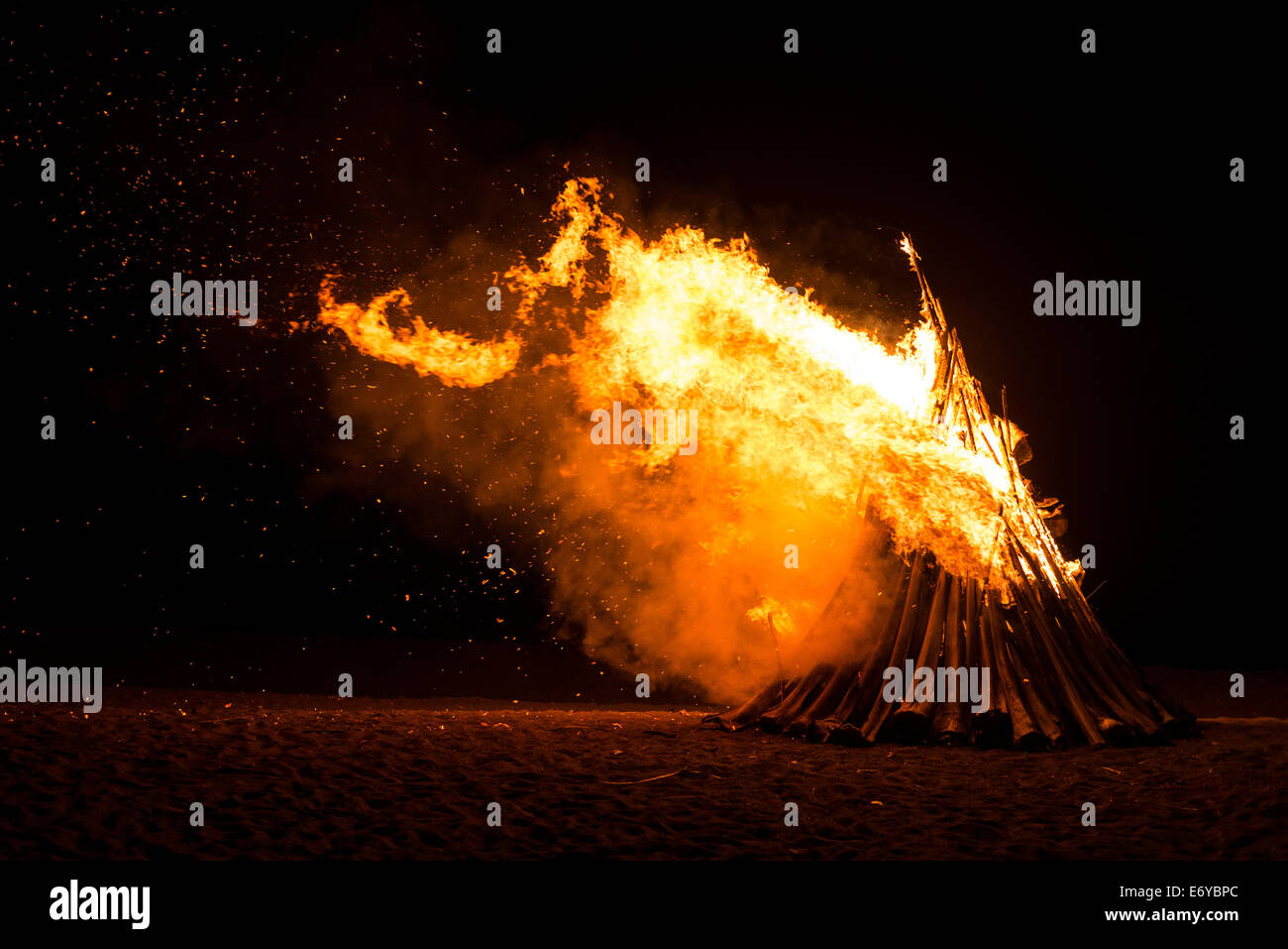 Blazing bonfire on the beach of a small island in the Philippines Stock ...