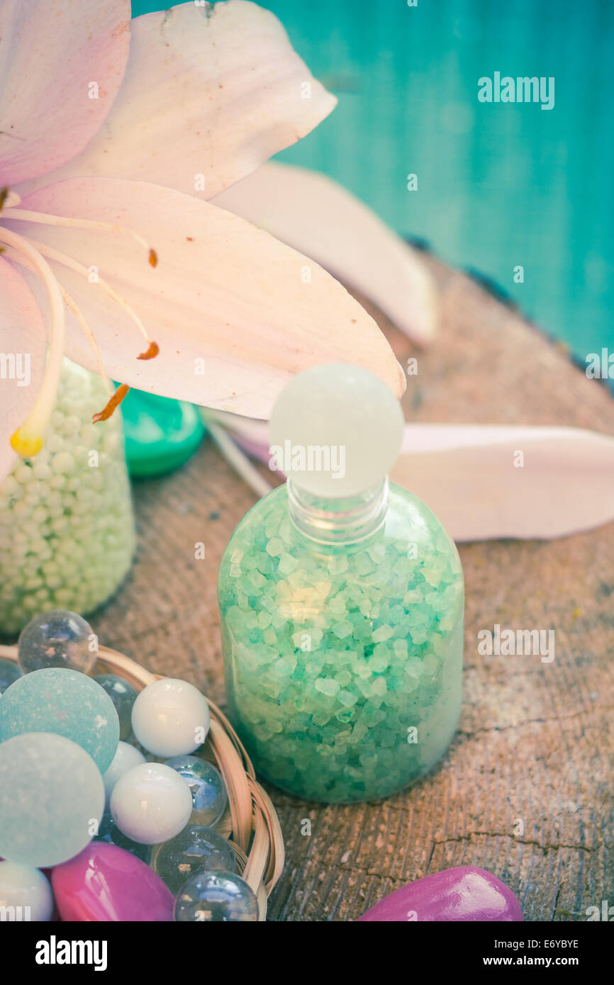 Spa concept with flower lily and salt bathing Stock Photo - Alamy