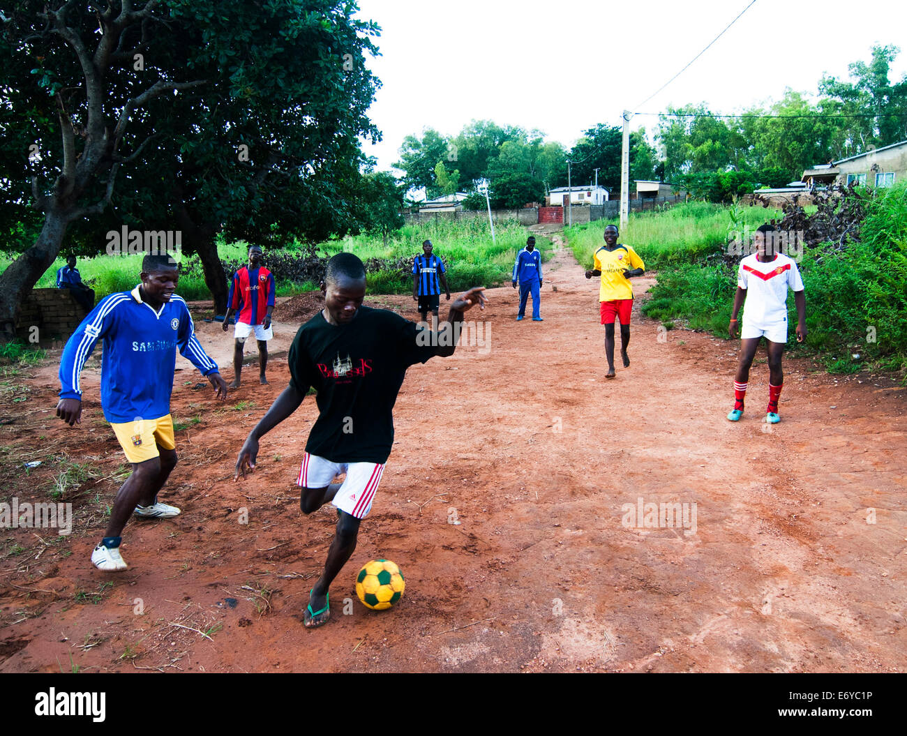 African boys playing soccer hi-res stock photography and images - Alamy