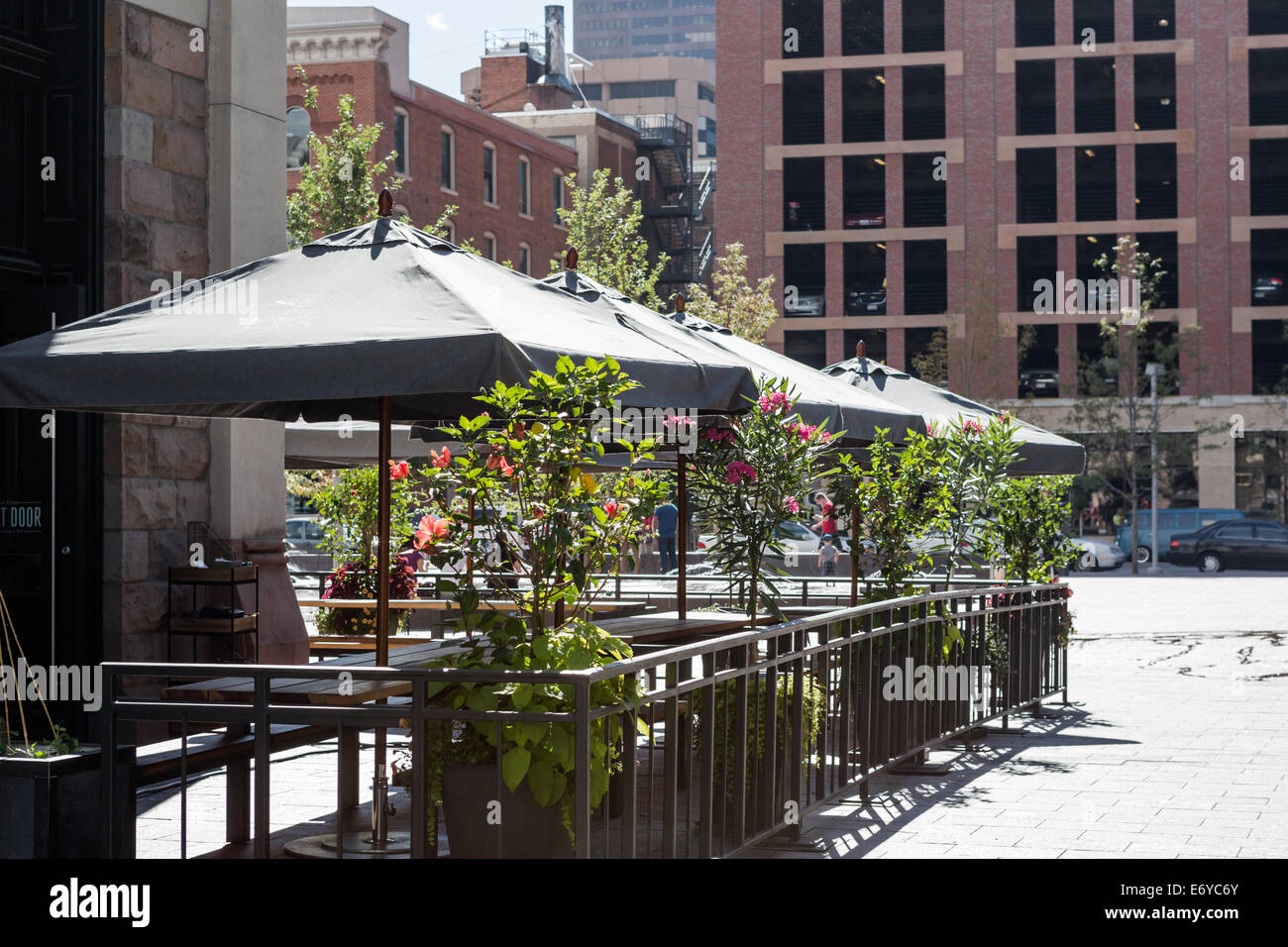 Empty patio of restaurant in urban area Stock Photo - Alamy