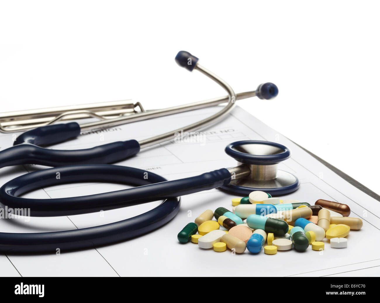 stethoscope on prescription and pills on white background Stock Photo ...