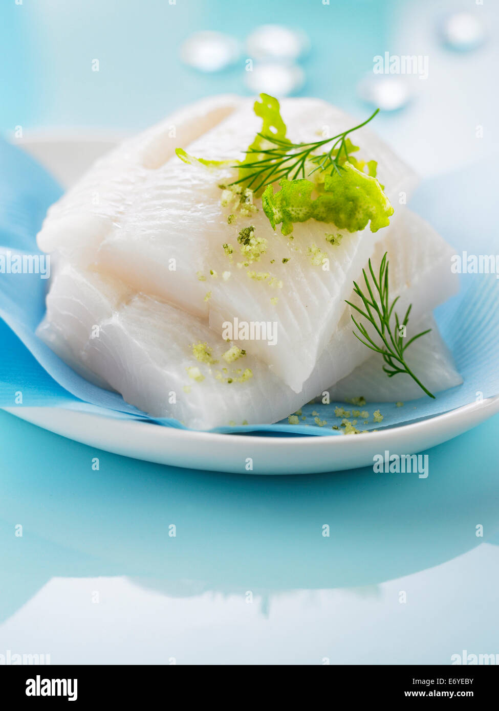 Raw halibut fillets Stock Photo - Alamy