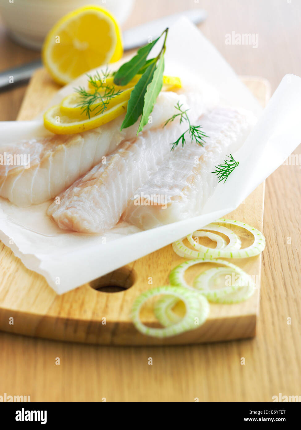 Raw bass fillets Stock Photo - Alamy