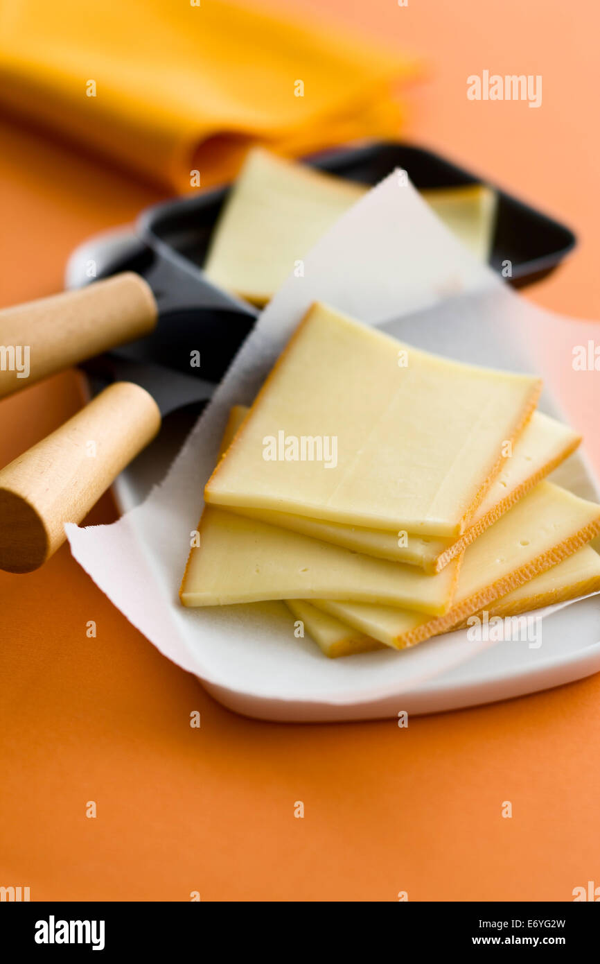 Raclette cheese and pan Stock Photo - Alamy