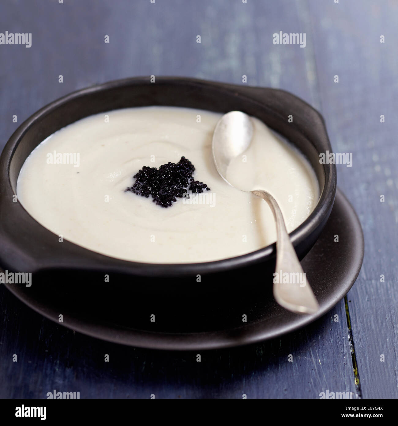 Cream of jerusalem artichoke soup with lump fish roe Stock Photo - Alamy