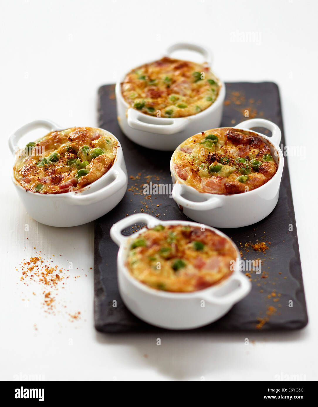 Individual pea and ham flans Stock Photo - Alamy