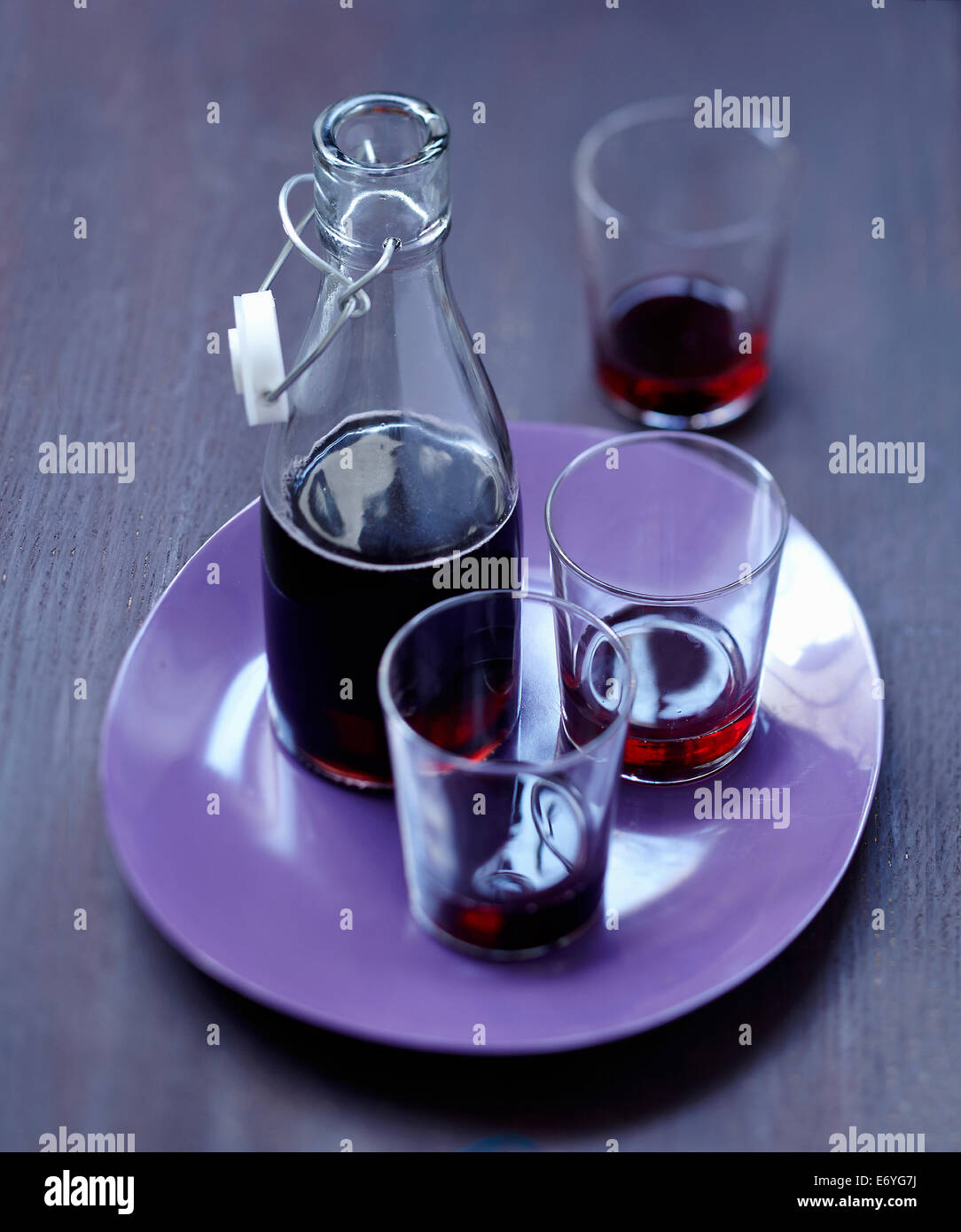 Licorice-flavored blackcurrant syrup Stock Photo - Alamy
