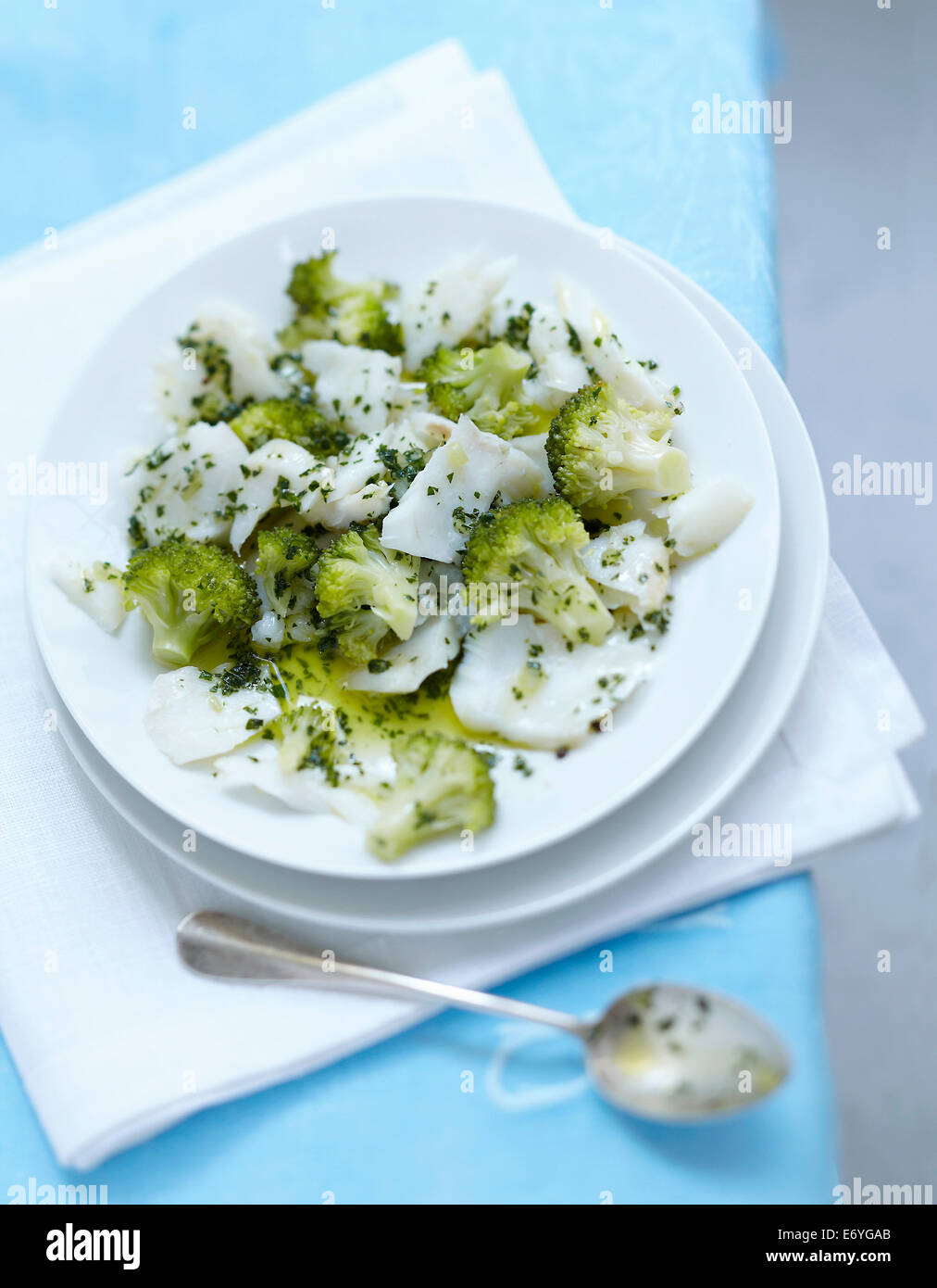 Flaked salt cod with broccolis and parsley butter Stock Photo - Alamy