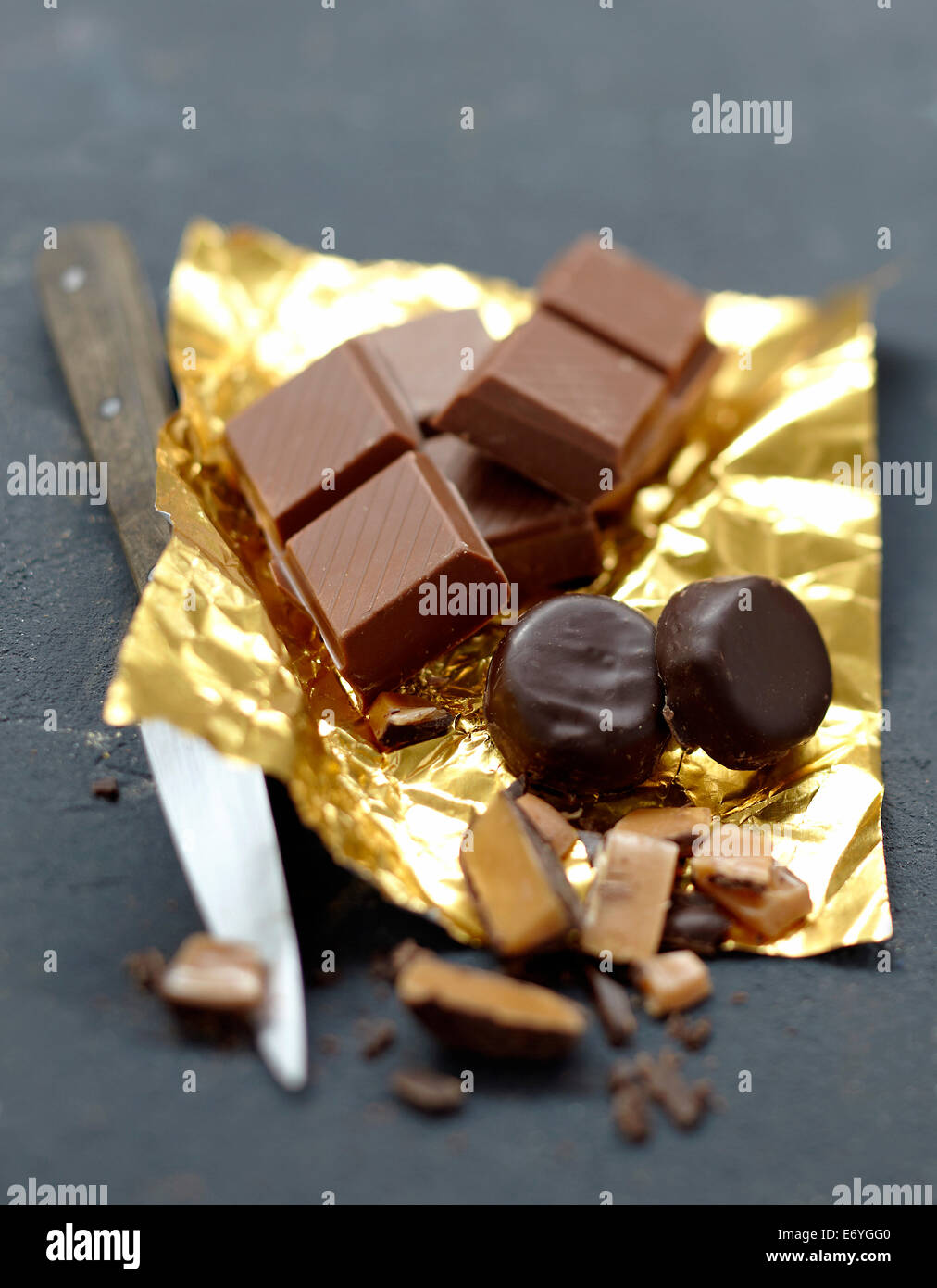 Michoko and squares of chocolate Stock Photo - Alamy