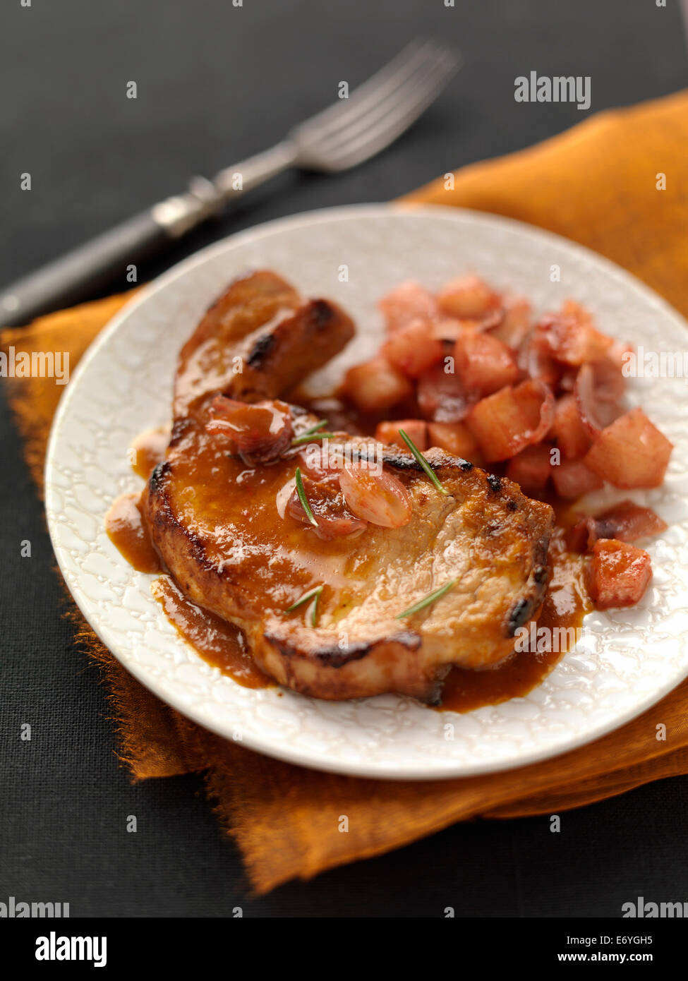 Pork chop and turnips with paprika sauce Stock Photo - Alamy