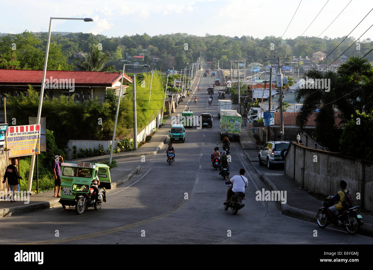 Motorcycle taxis and transport on bridge separating Panglao and Bohol ...