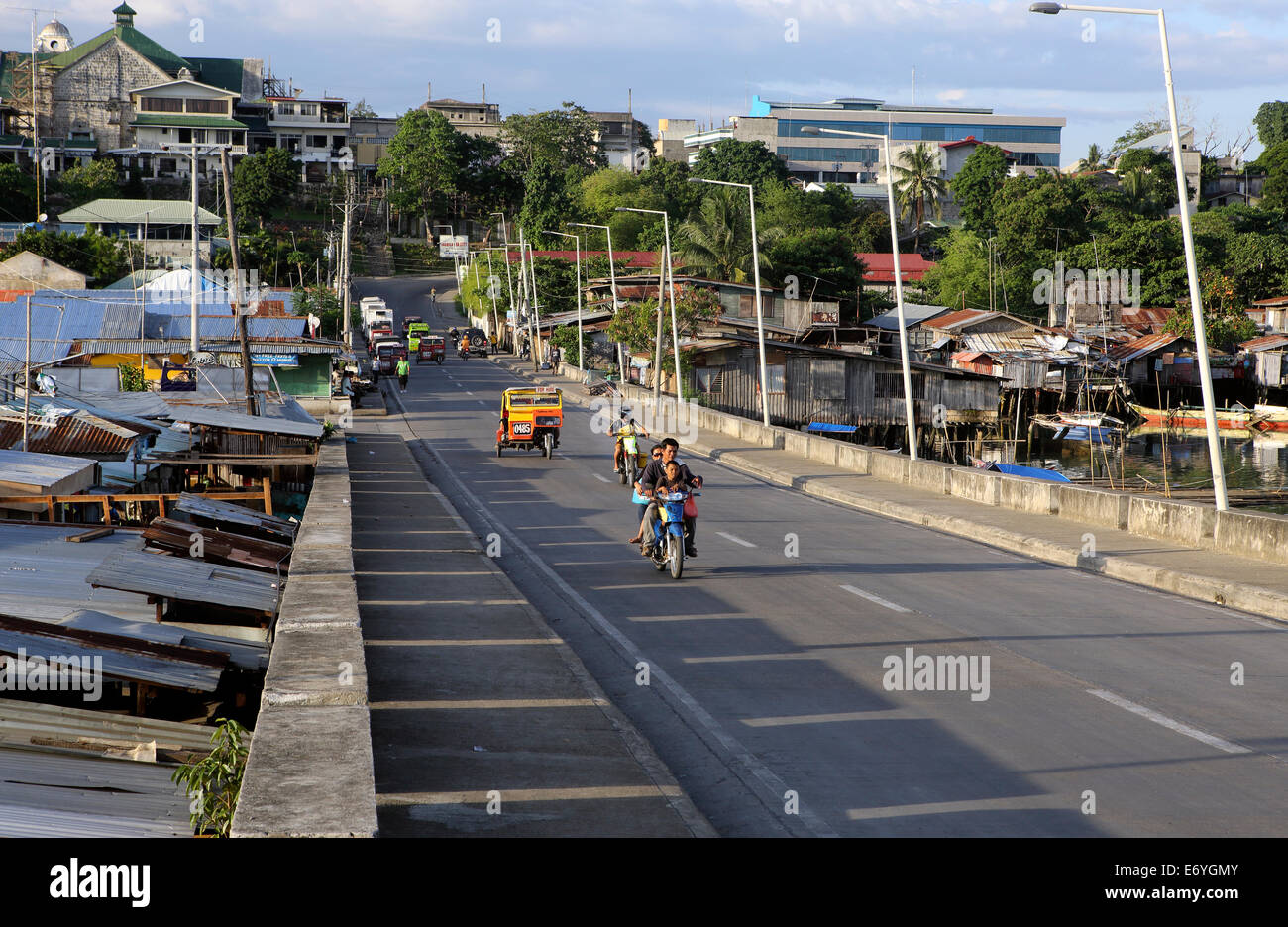Motorcycle taxis and transport on bridge separating Panglao and Bohol ...