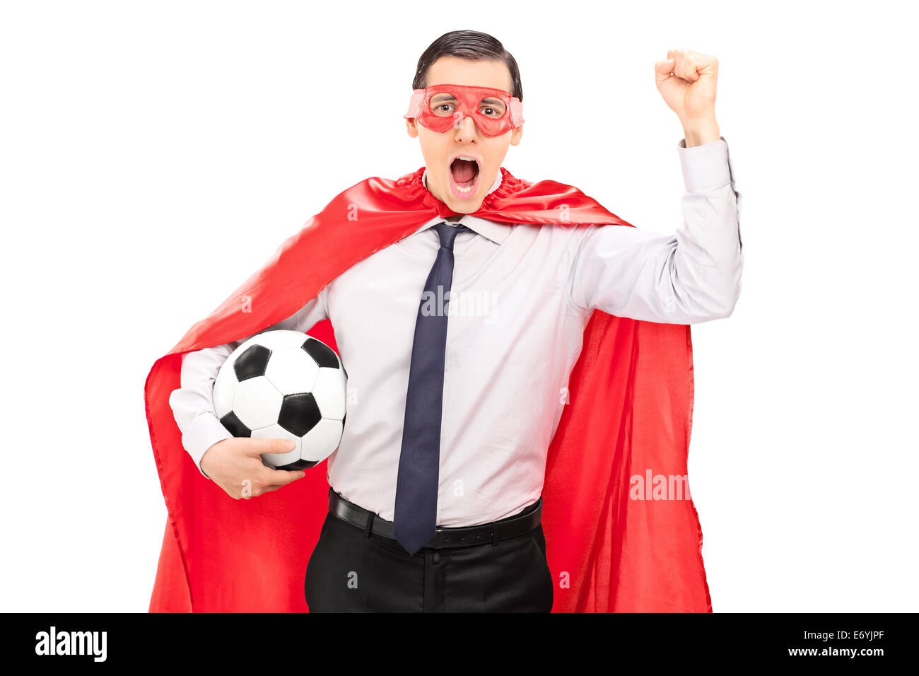Superhero cheering and holding a football isolated on white background ...