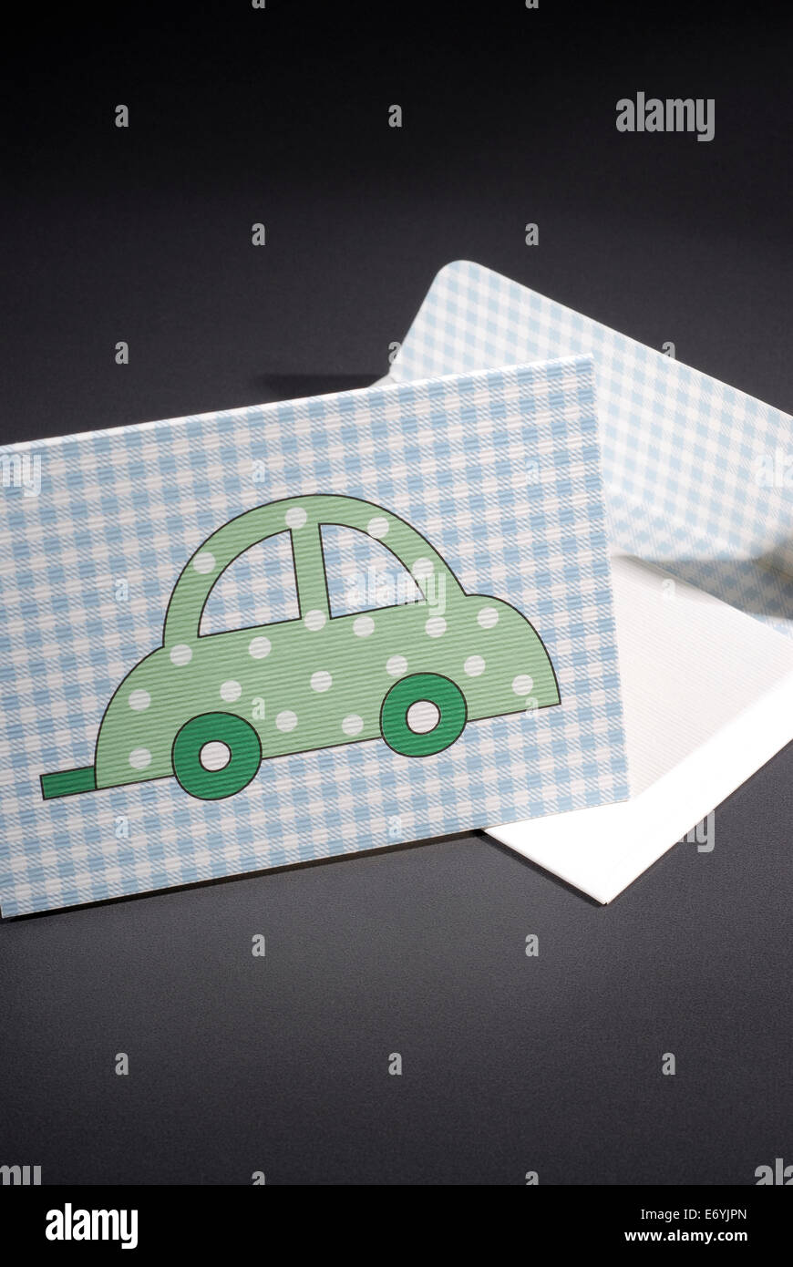 Invitation envelope and card for a baptism Stock Photo - Alamy