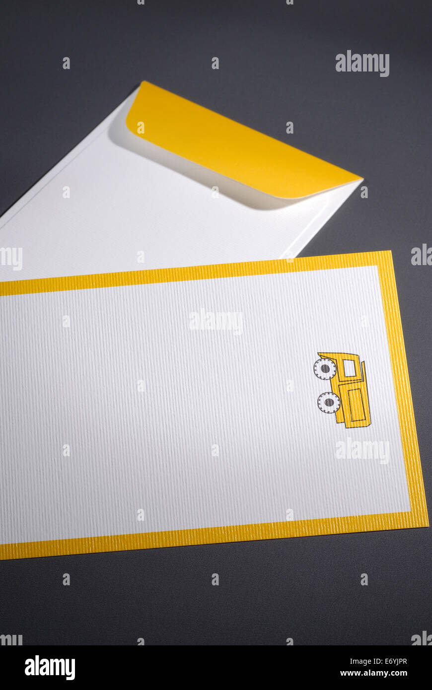 Invitation envelope and card for a baptism Stock Photo - Alamy