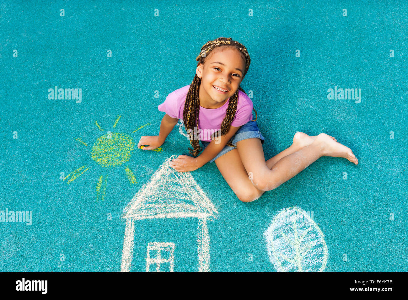 Nice black girl with chalk drawing Stock Photo - Alamy
