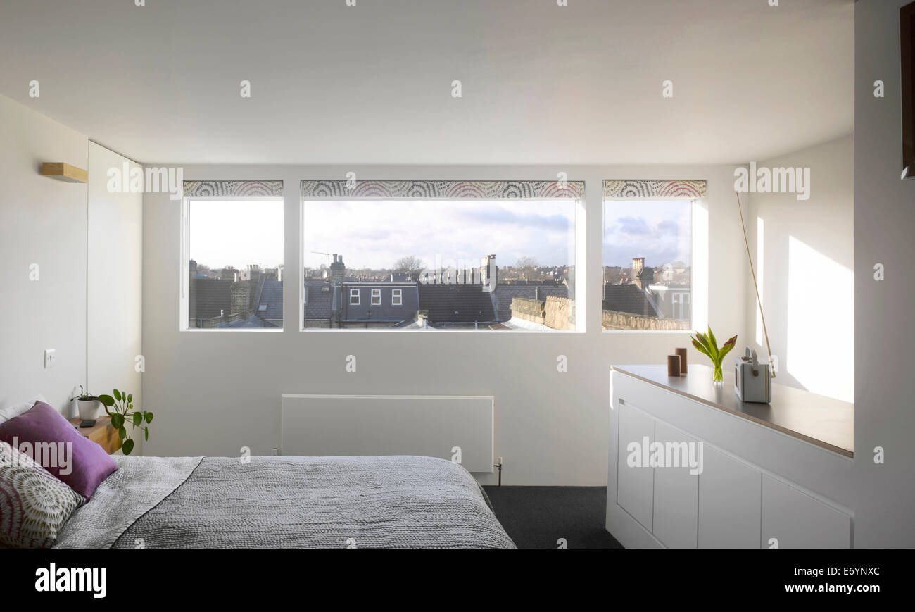 Picture window in guest bedroom created by roof extension. Views over ...