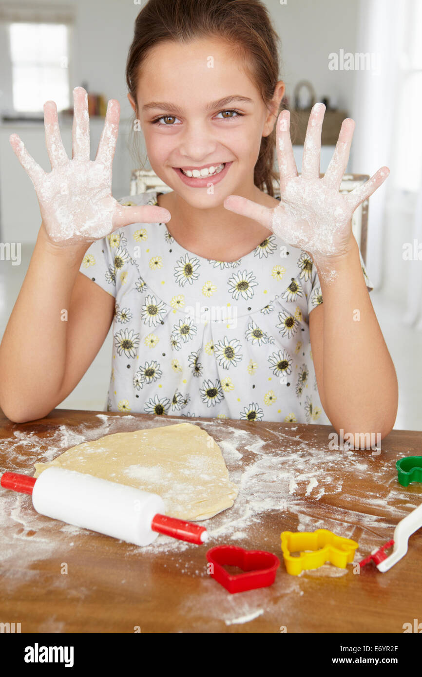Young girl baking Stock Photo - Alamy