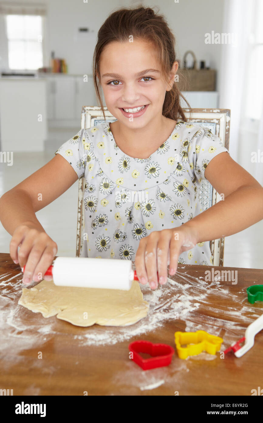 Young girl baking Stock Photo - Alamy