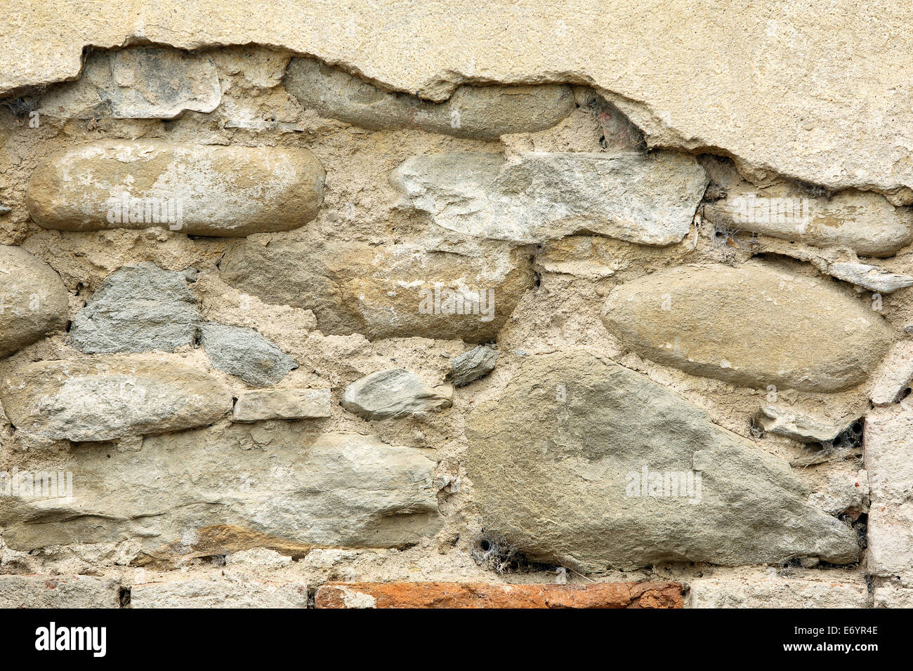 Stone wall background with cracks Stock Photo - Alamy
