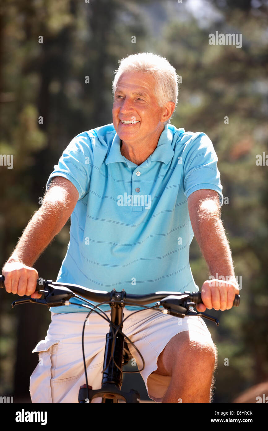Senior man on country bike ride Stock Photo - Alamy