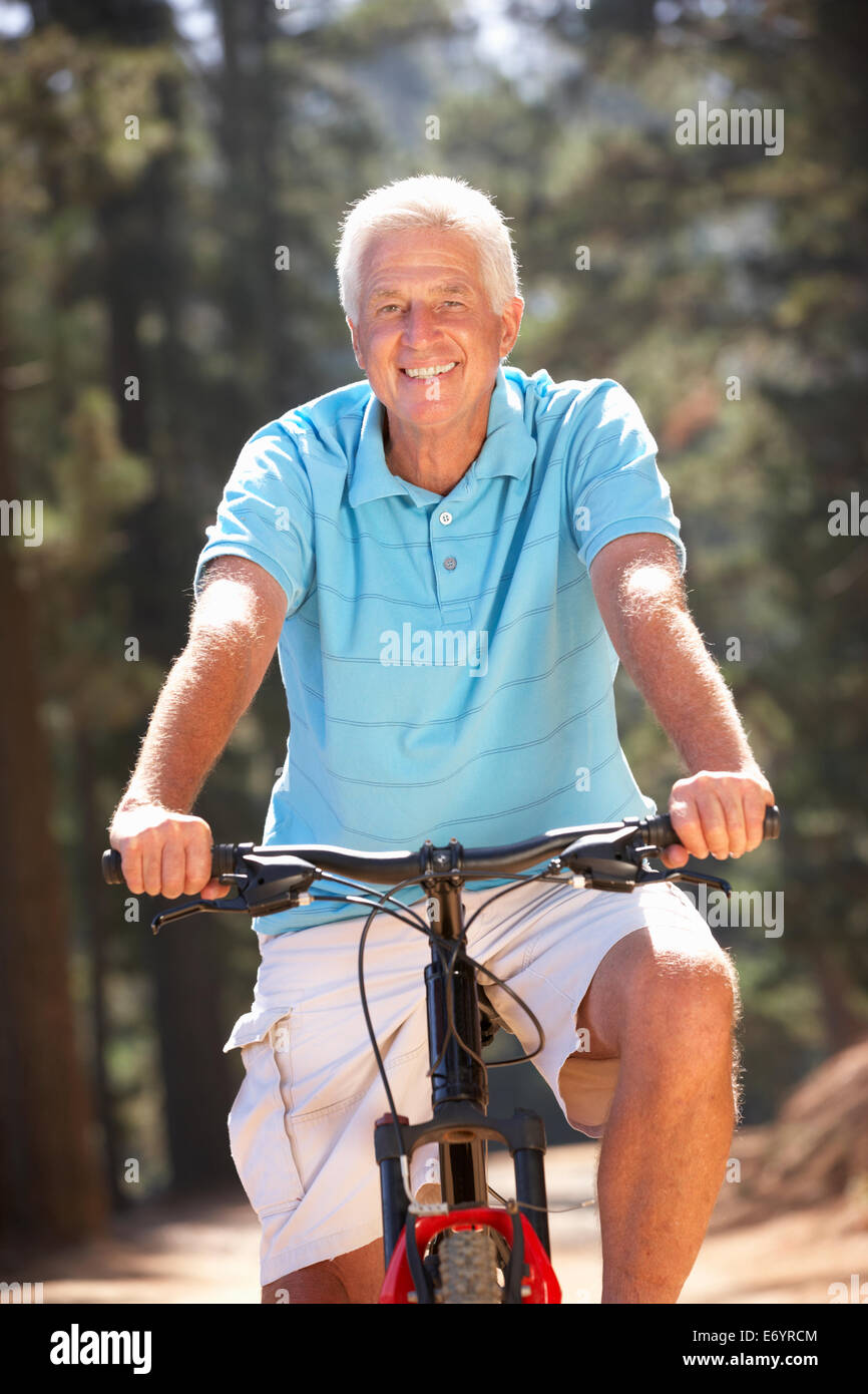 Senior man on country bike ride Stock Photo - Alamy